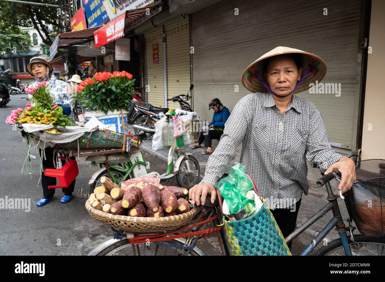 Woman sweet potato asia hi-res stock photography and images - Alamy