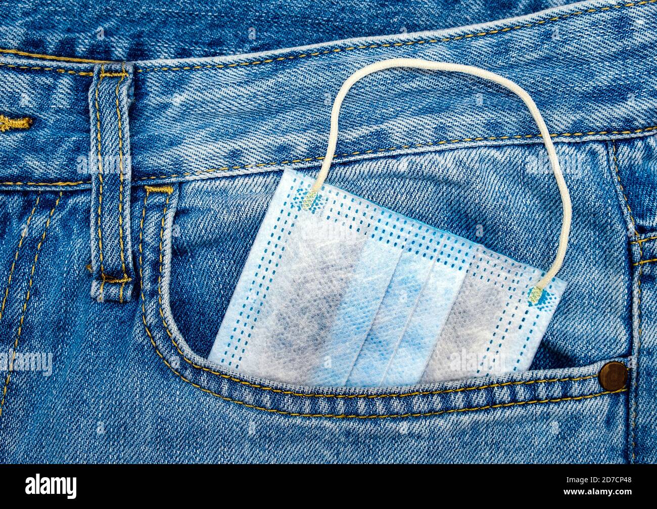 Medical mask in jeans pocket hi-res stock photography and images - Alamy