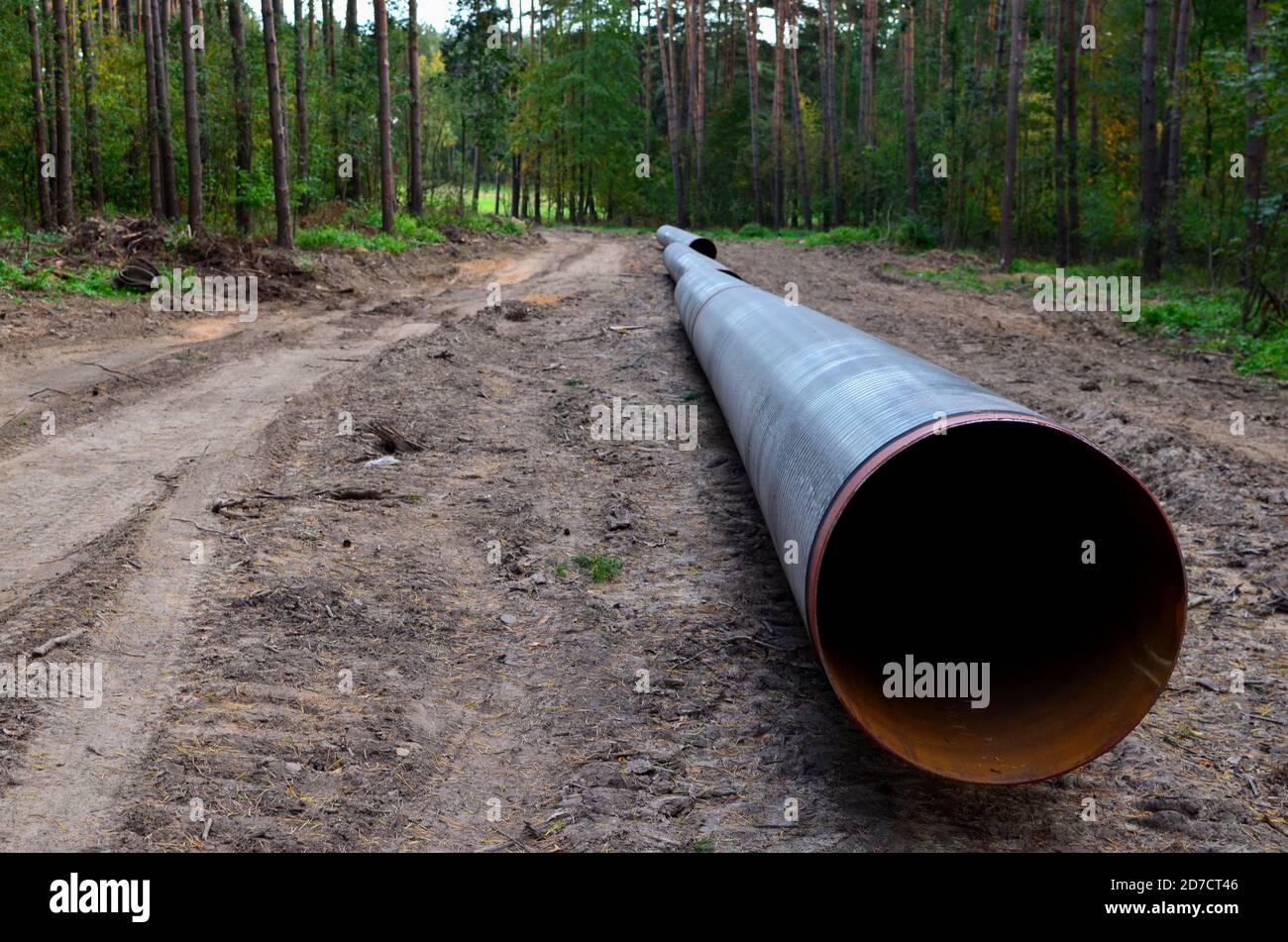 Natural gas pipeline construction work. A dug trench in the ground for ...