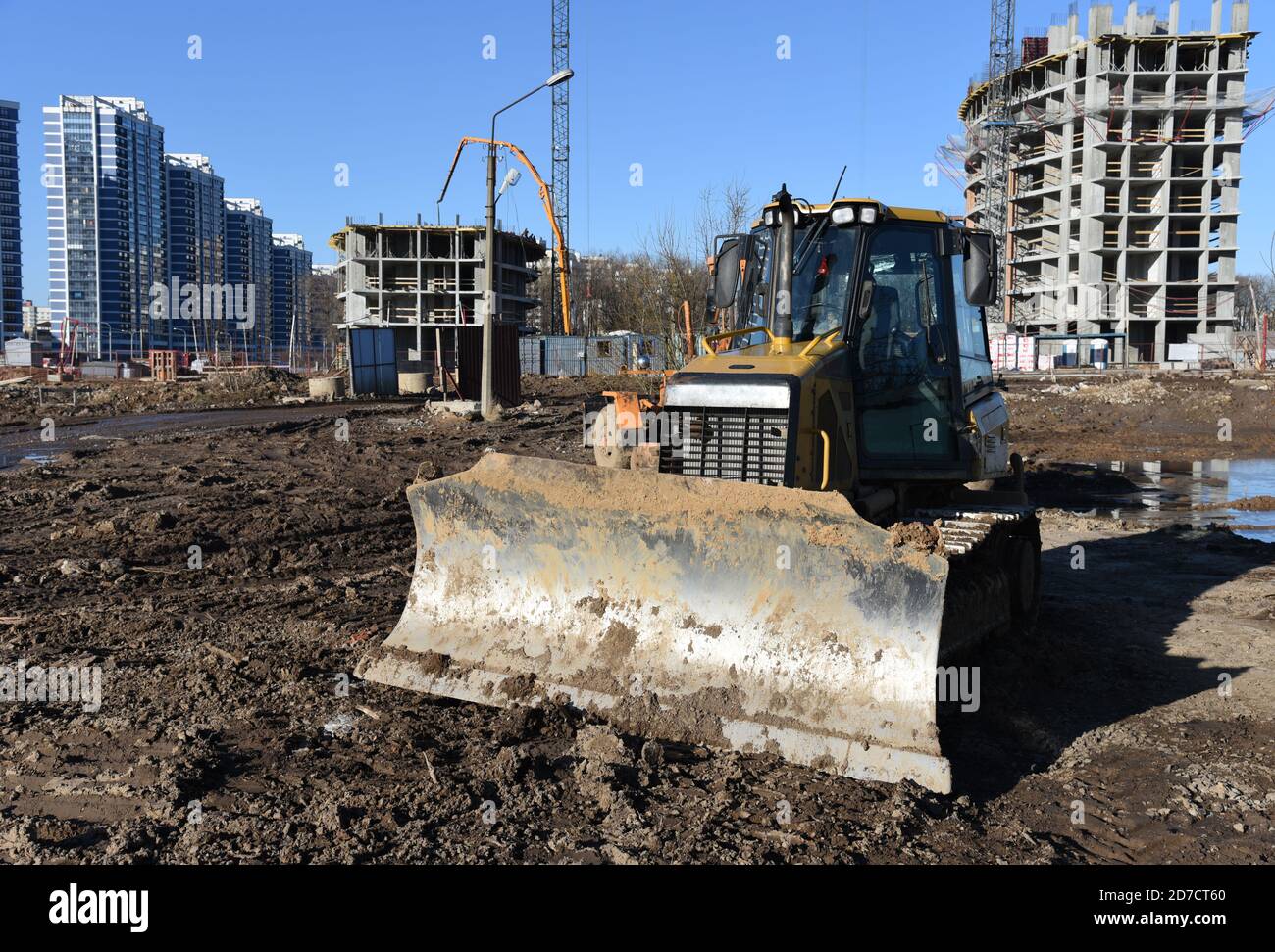 Dozer working at construction site. Bulldozer for land clearing ...