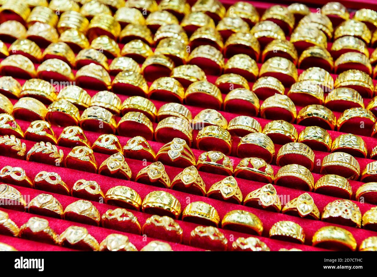 Gold rings collection on display Stock Photo - Alamy