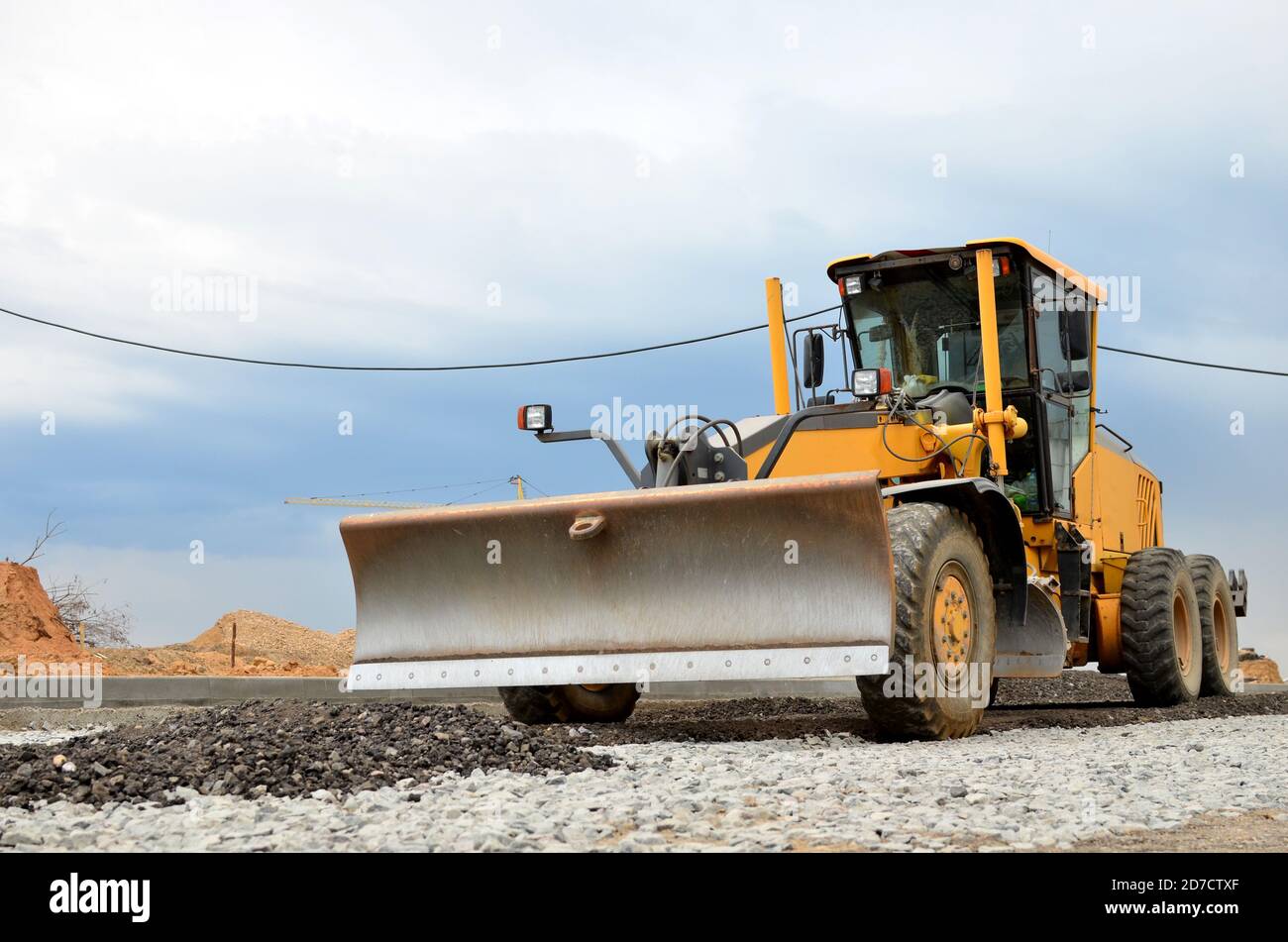 Сonstruction machine Motor Grader at a construction site level the ...