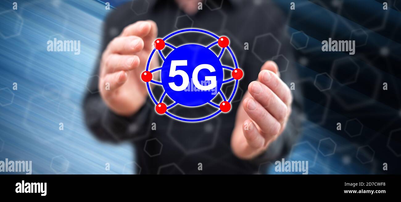 5g concept between hands of a man in background Stock Photo - Alamy