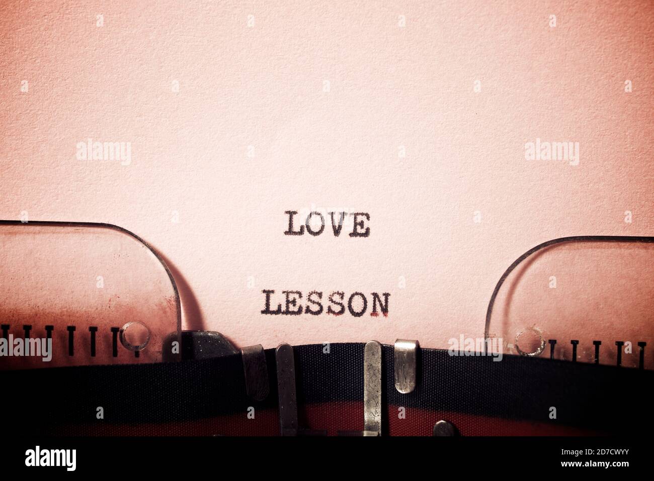 Love lesson phrase written with a typewriter Stock Photo - Alamy