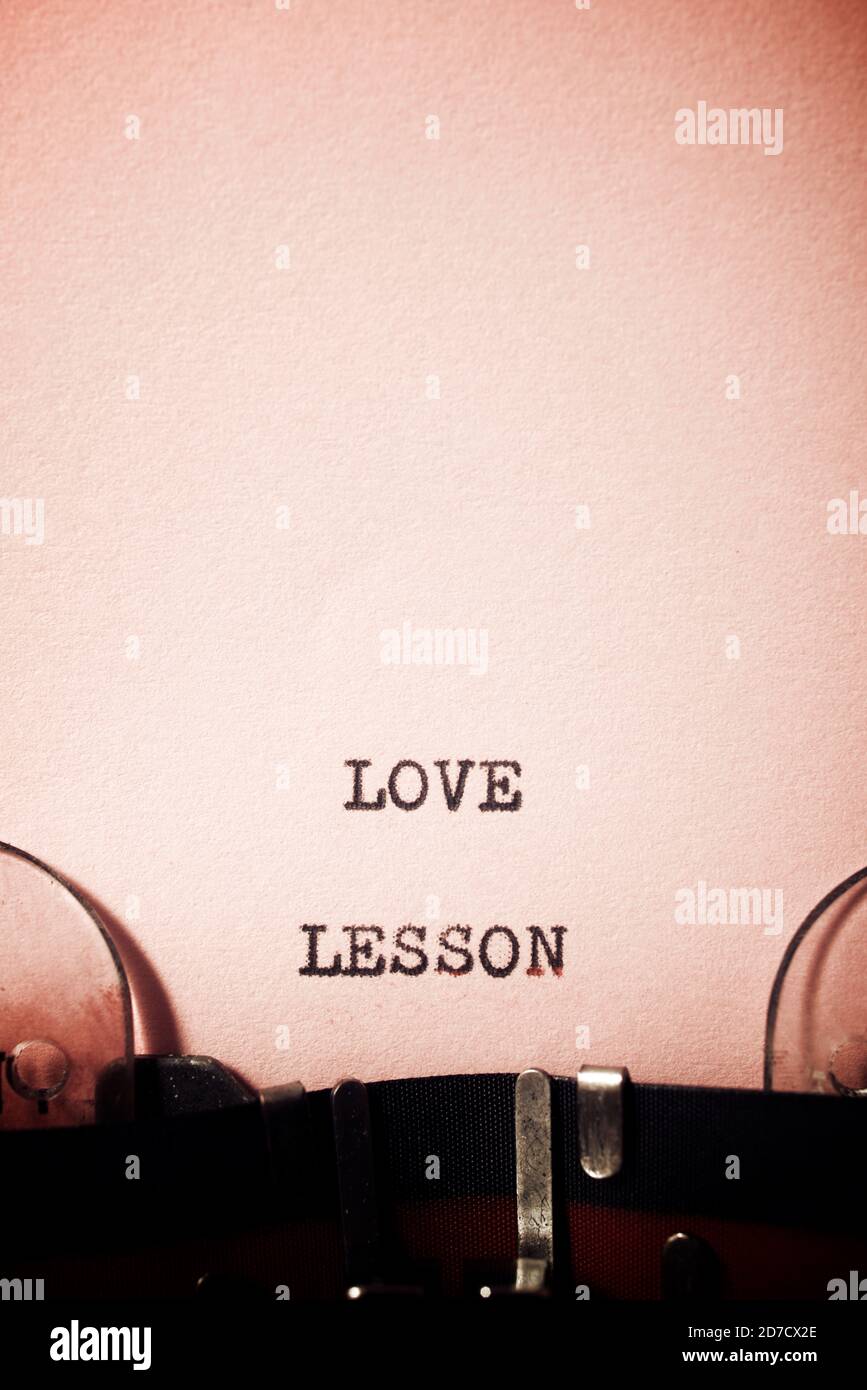 Love lesson phrase written with a typewriter Stock Photo - Alamy