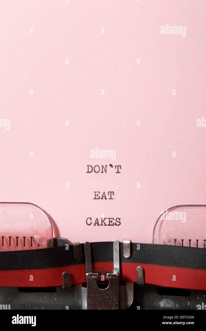 Don´t eat cakes phrase written with a typewriter Stock Photo - Alamy