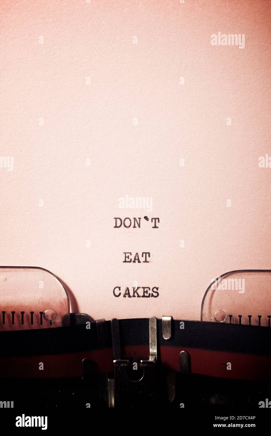 Don´t eat cakes phrase written with a typewriter Stock Photo - Alamy