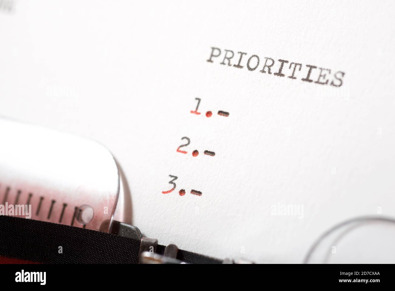 Priorities word written with a typewriter Stock Photo - Alamy