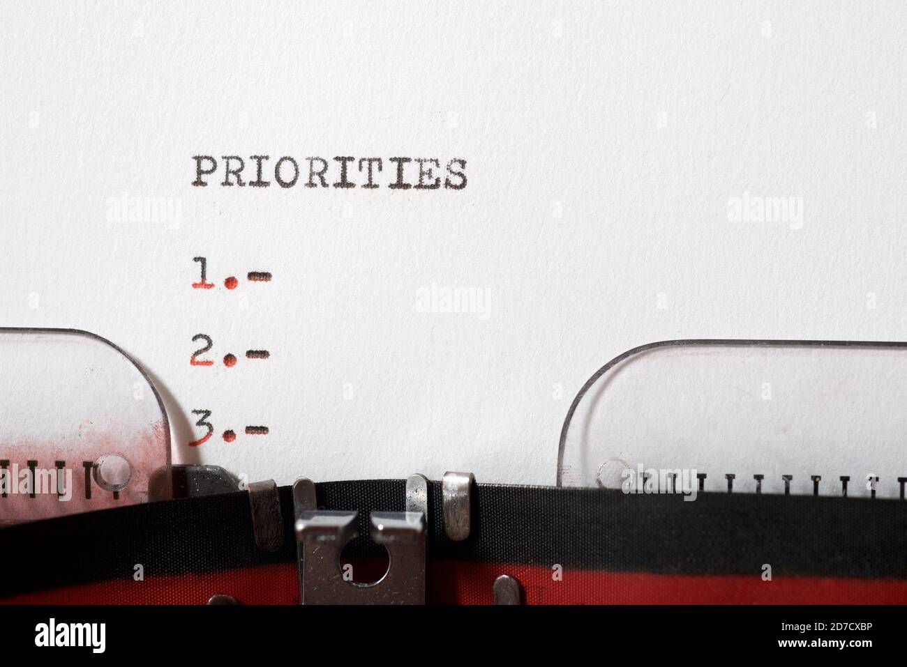 Priorities word written with a typewriter Stock Photo - Alamy
