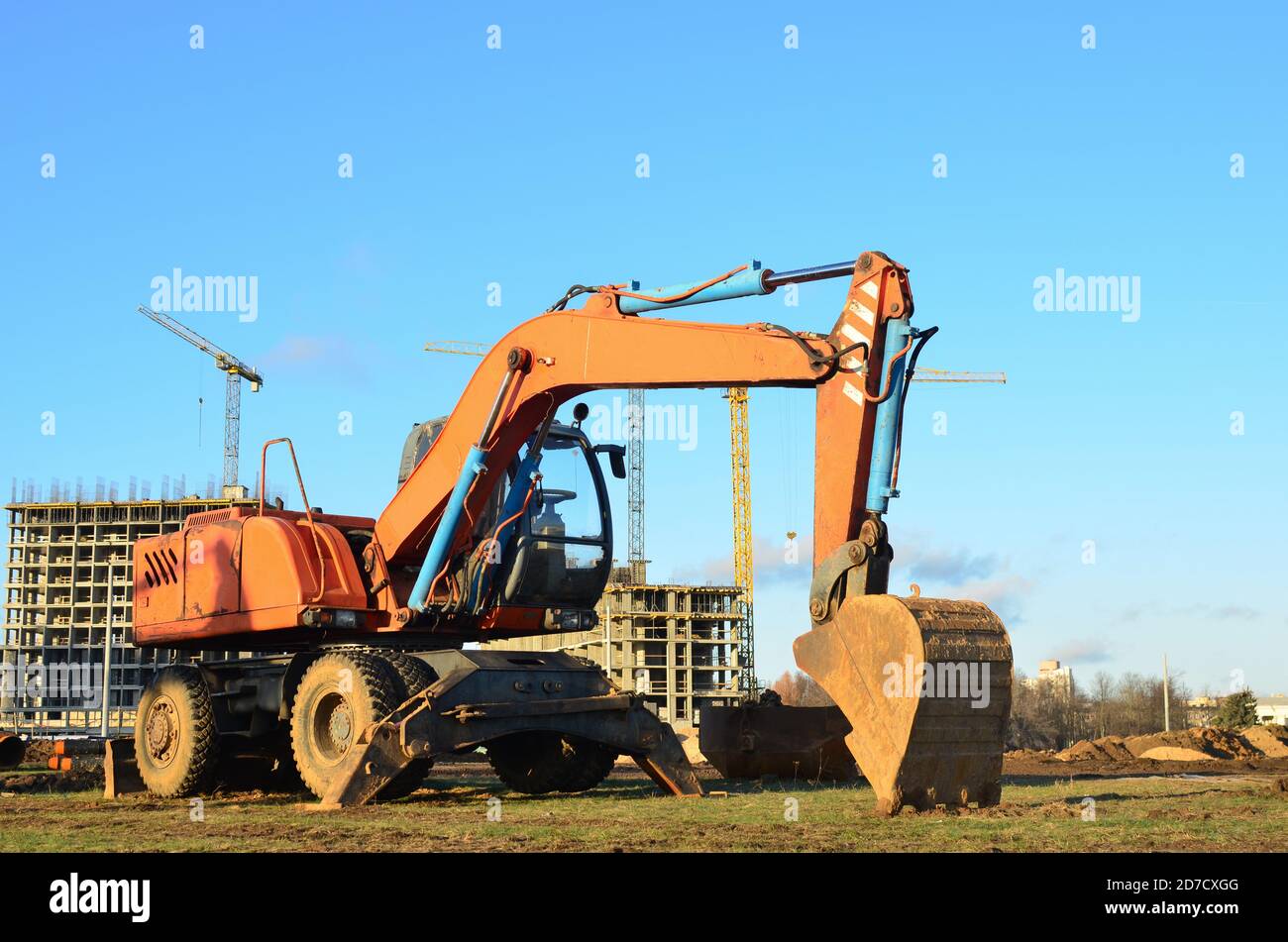 Hydraulic excavator installing pipeline hi-res stock photography and ...