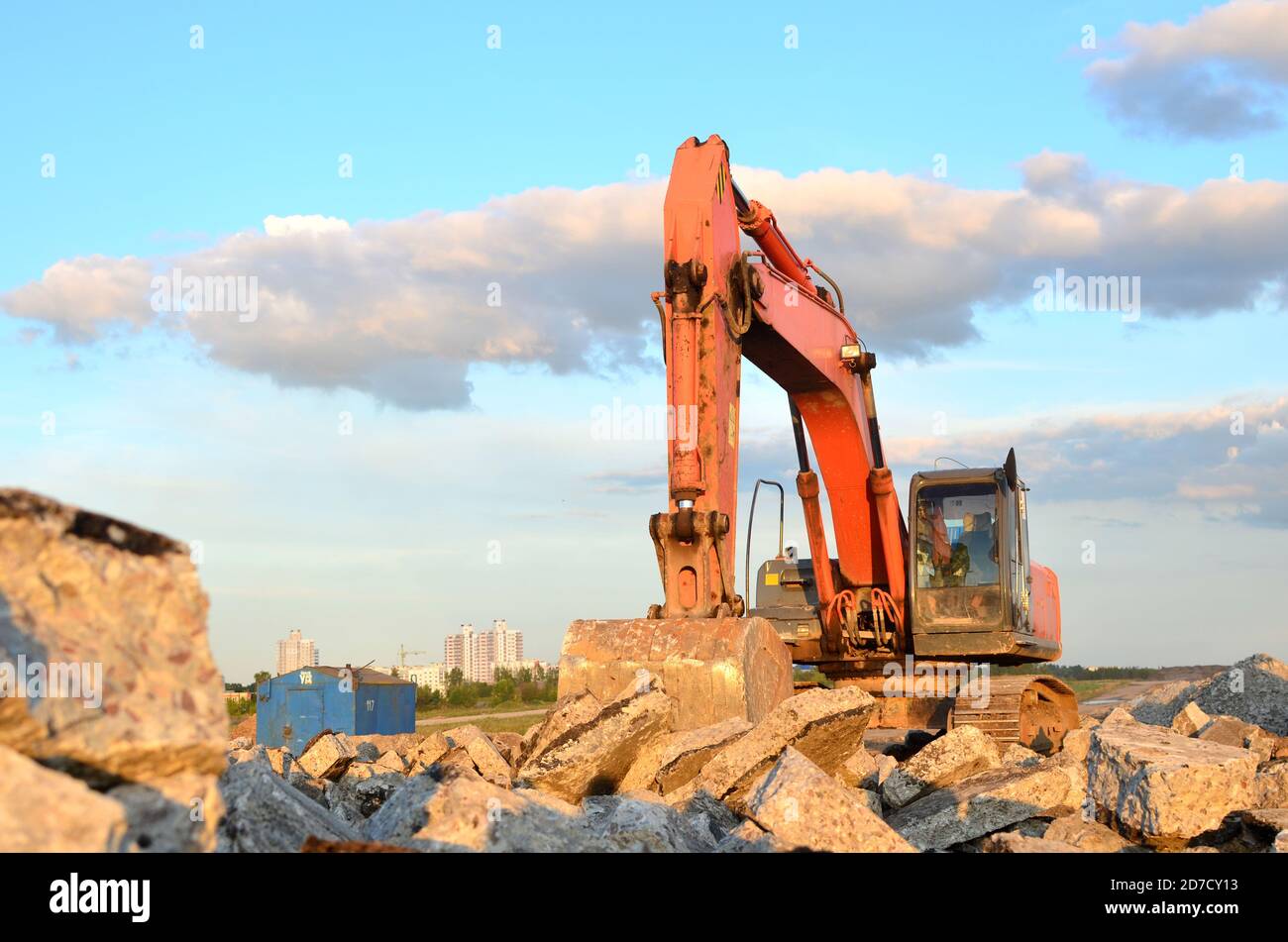 Large tracked excavator works in a gravel pit. Loading of stone and ...
