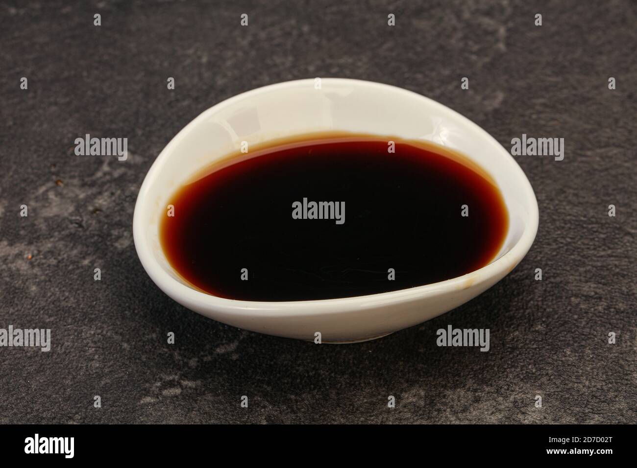 Asian cuisine - soya sauce in the bowl Stock Photo - Alamy