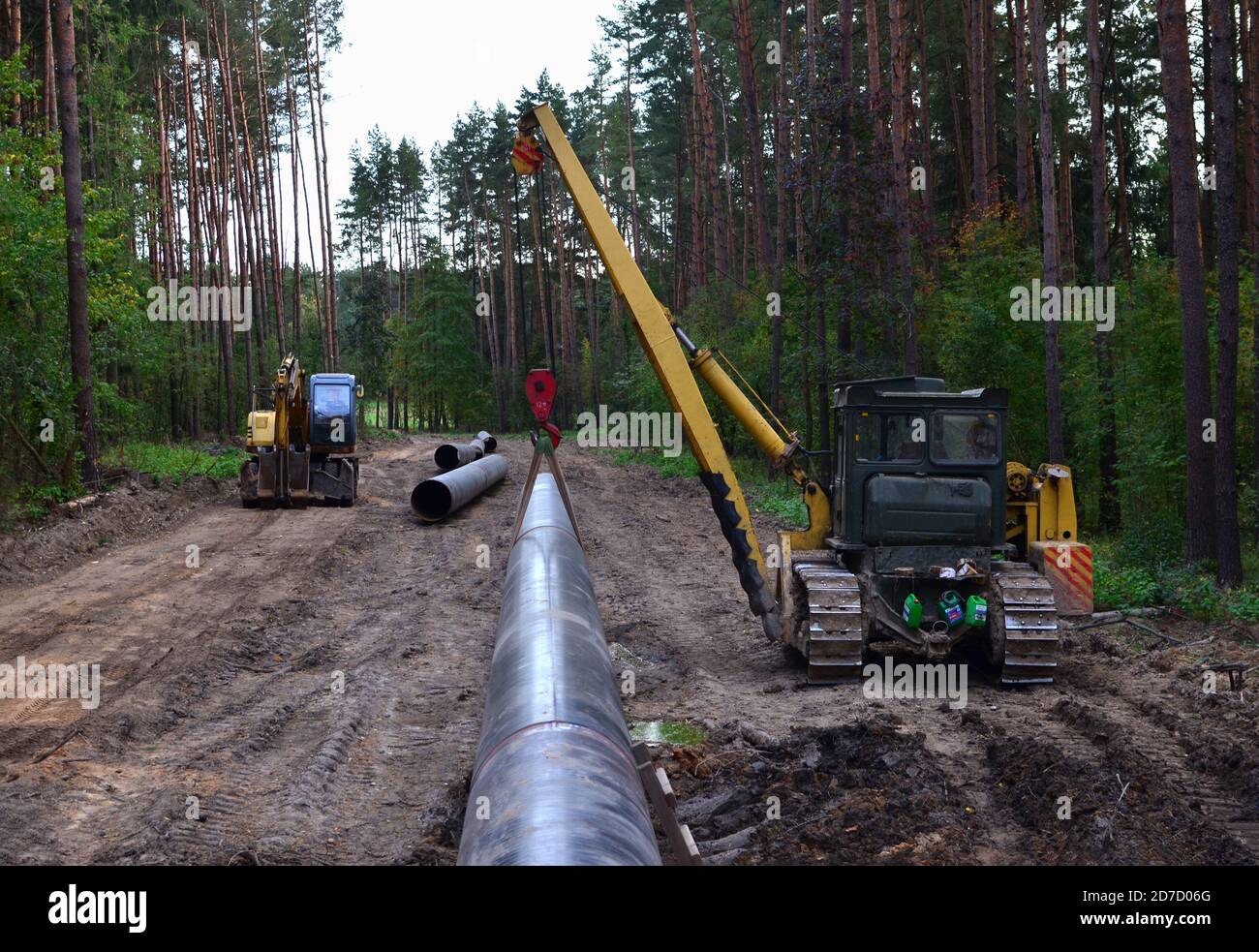 Natural gas pipeline construction work. A dug trench in the ground for ...