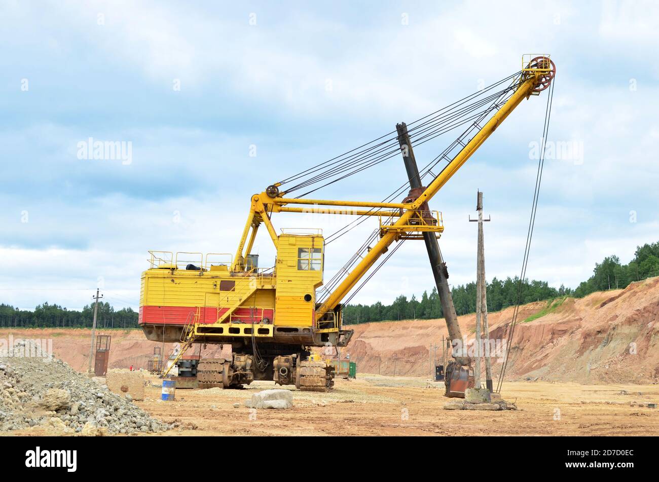 Huge mining excavator in the limestone open-pit. Biggest digger working ...
