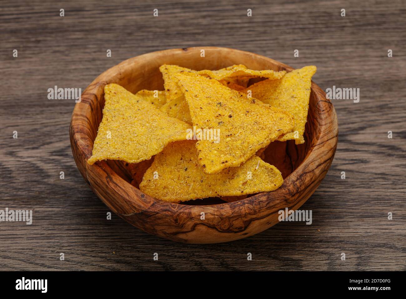 Mexican crunchy corn nachos triangle heap Stock Photo - Alamy