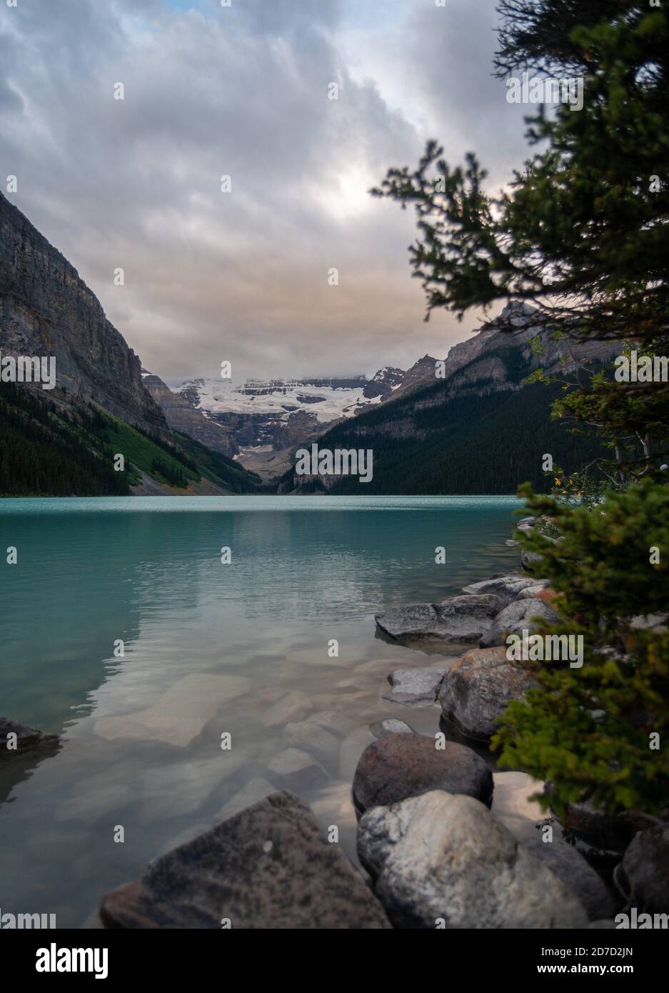 Vertical shot of the mountains and the Moraine Lake in Banff National ...