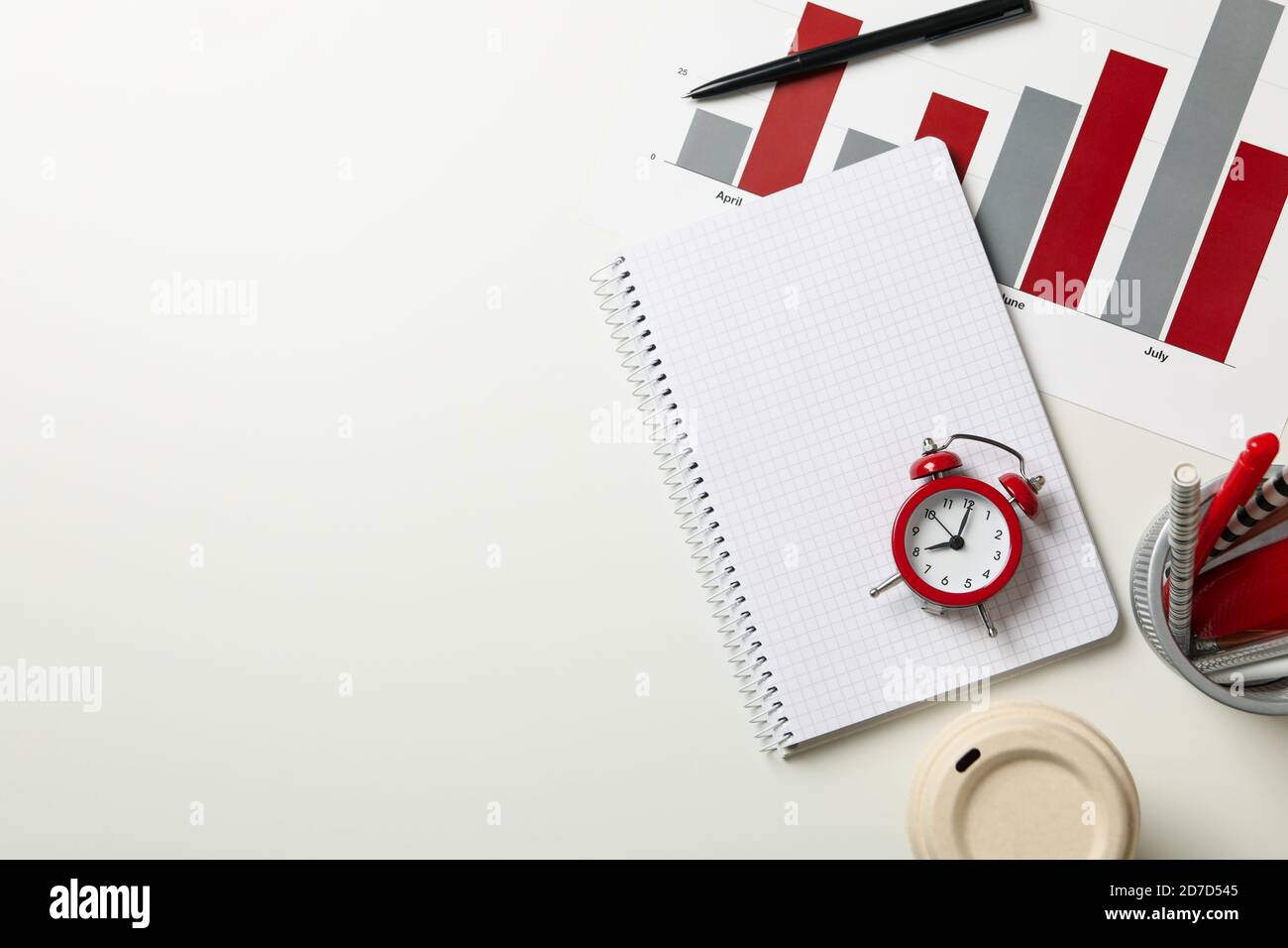 Concept of finance planning with alarm clock on white table Stock Photo ...