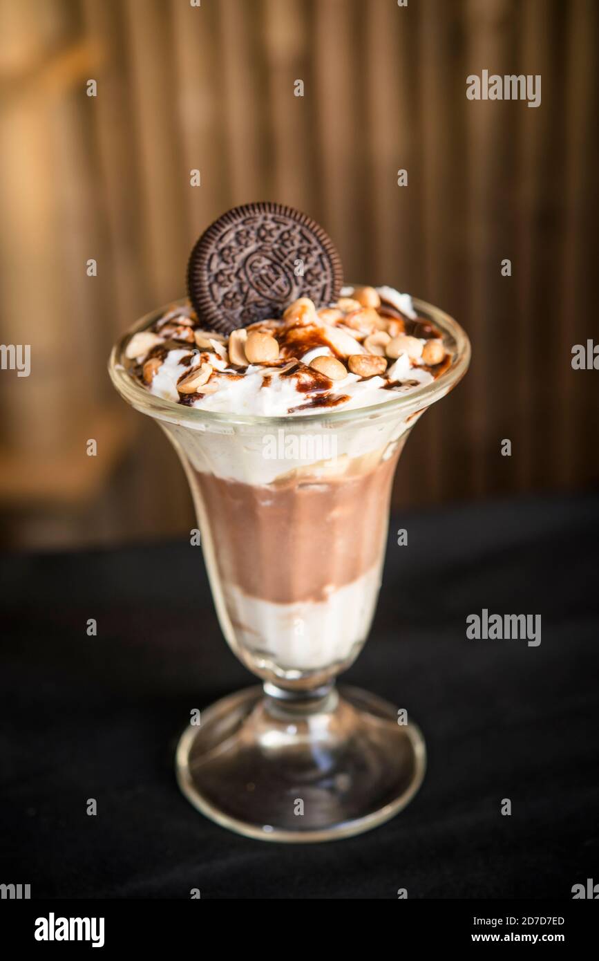 chocolate ice-cream sundae with biscuit on top for décor Stock Photo ...