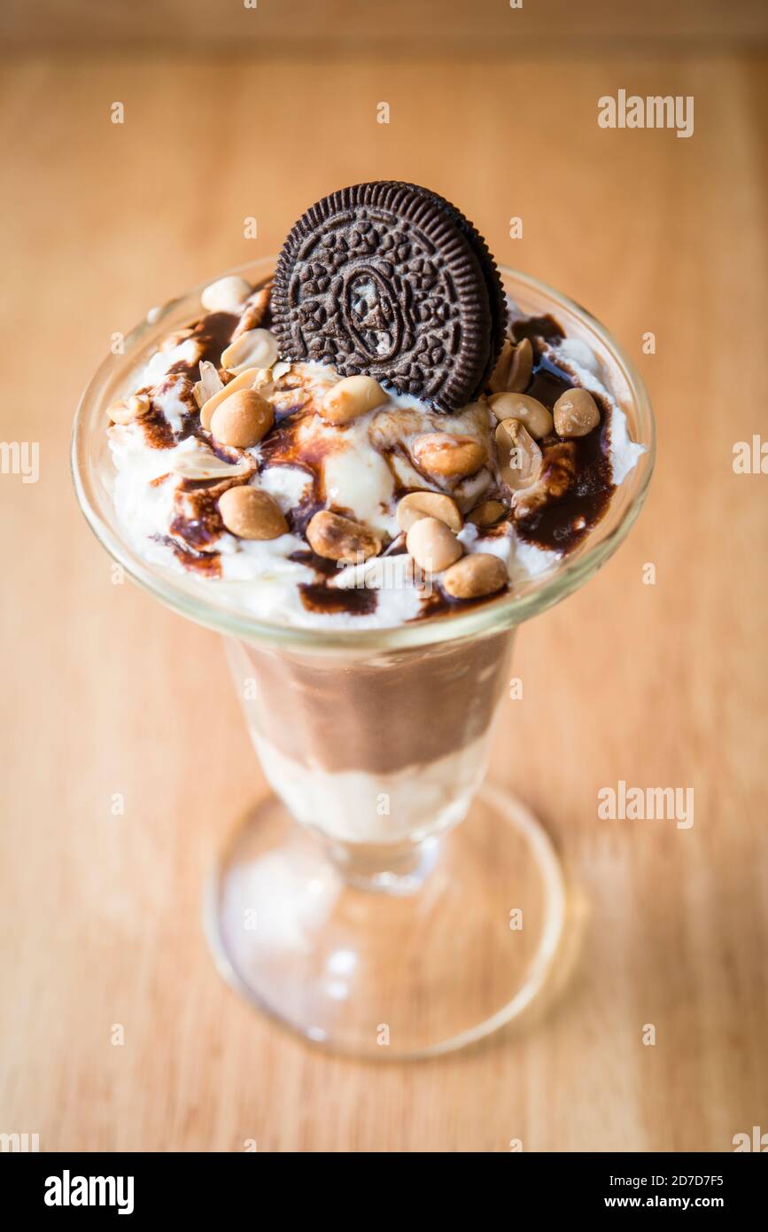 chocolate ice-cream sundae with biscuit on top for décor Stock Photo ...