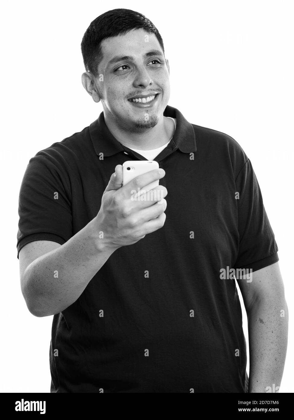 Happy hispanic man thinking using Black and White Stock Photos & Images ...