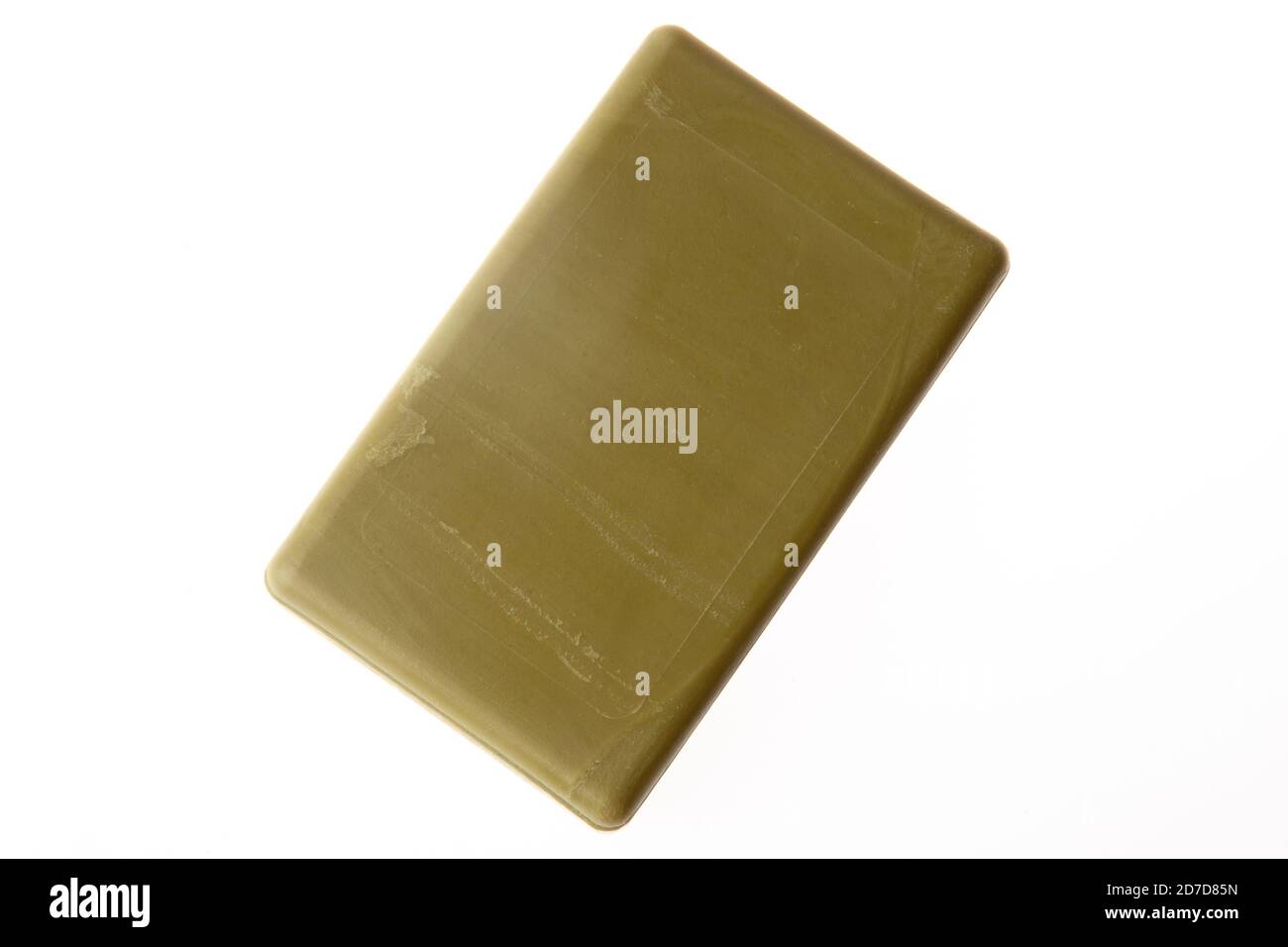 A bar of natural green soap isolated on white background. Studio shot ...