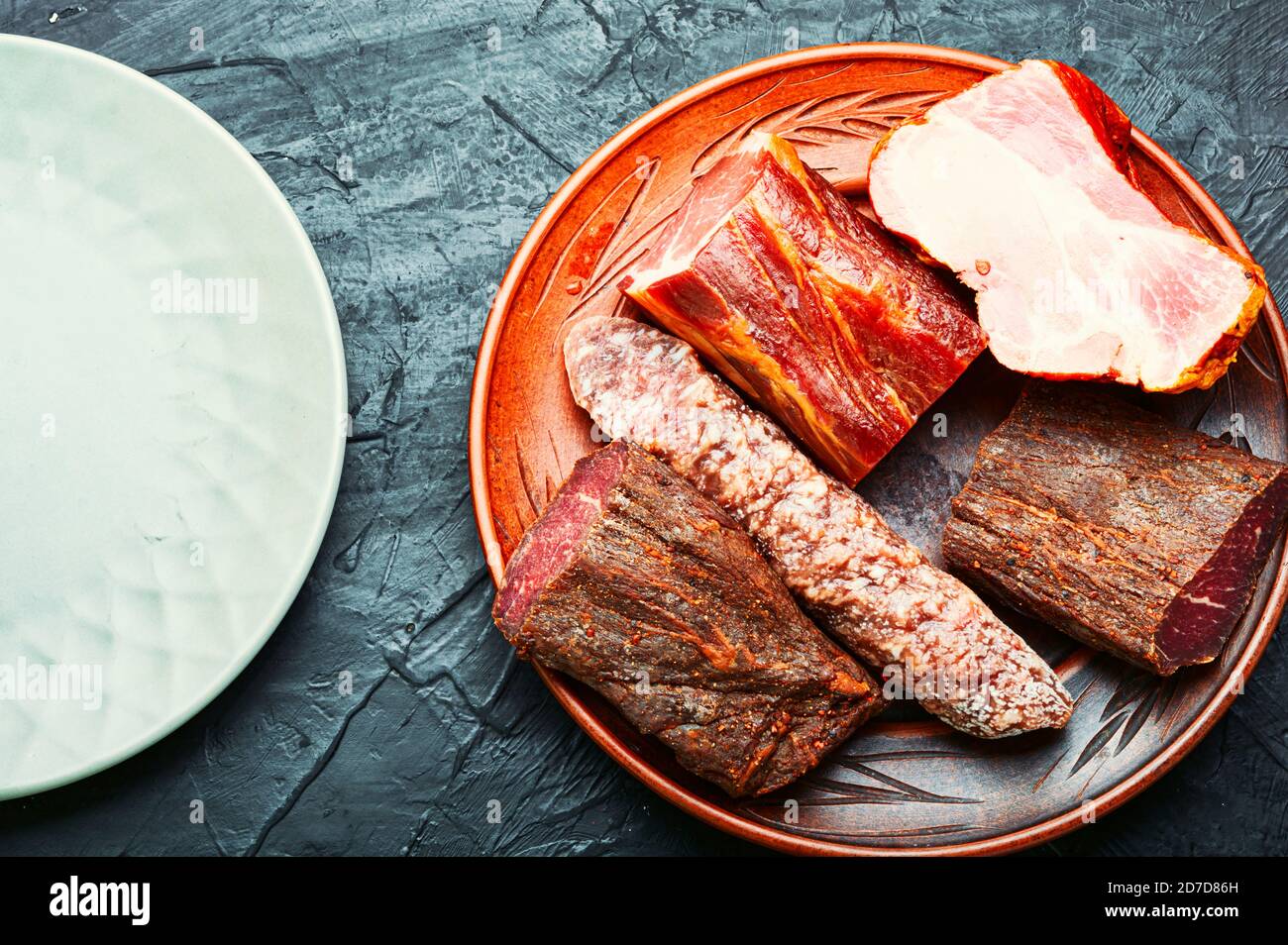 Italian meat platter.Cured meat and sausages.Smoked meat plate Stock ...