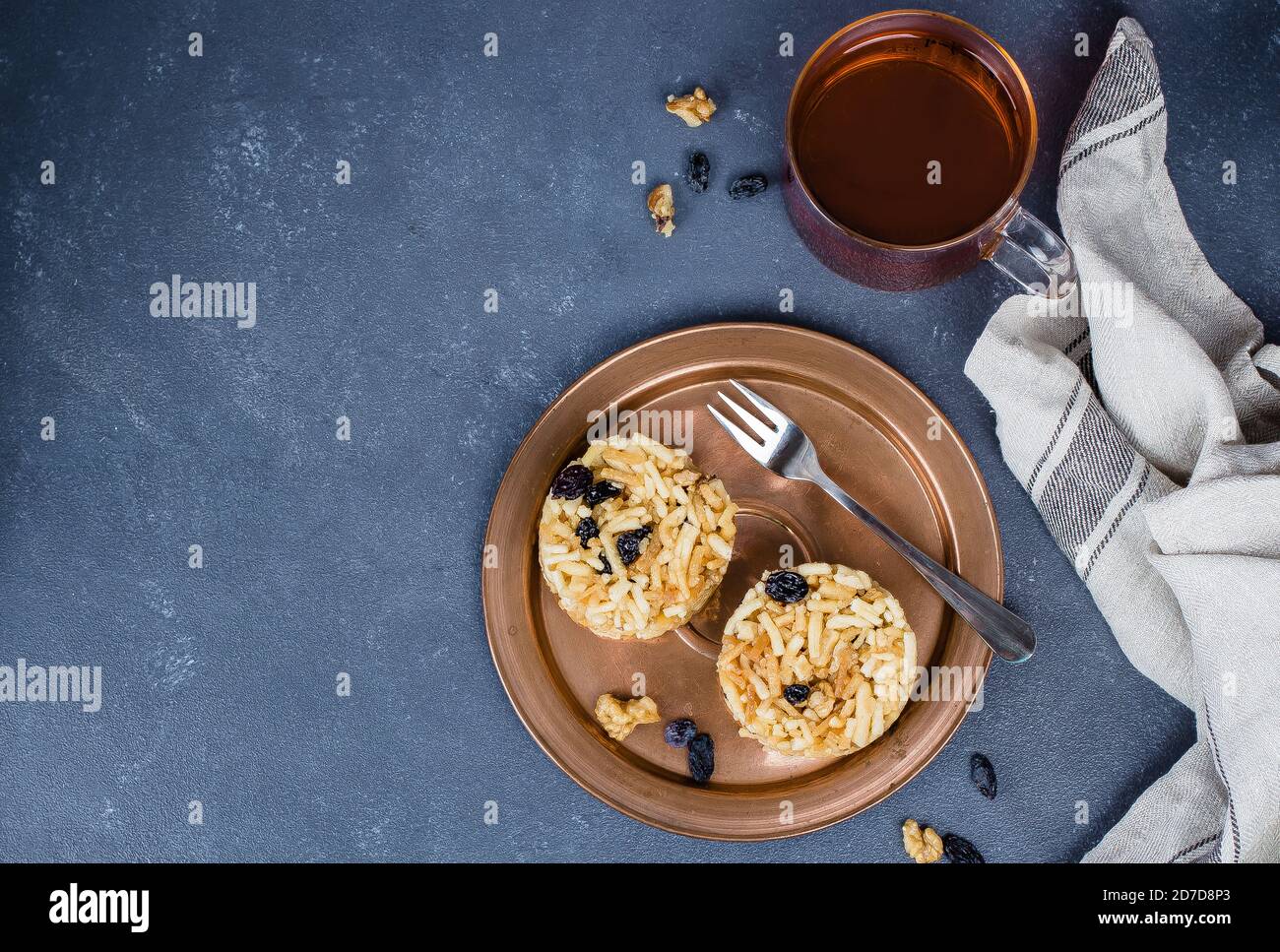 Eastern or Asian sweets (chak-chak) with honey, raisins and walnut on ...