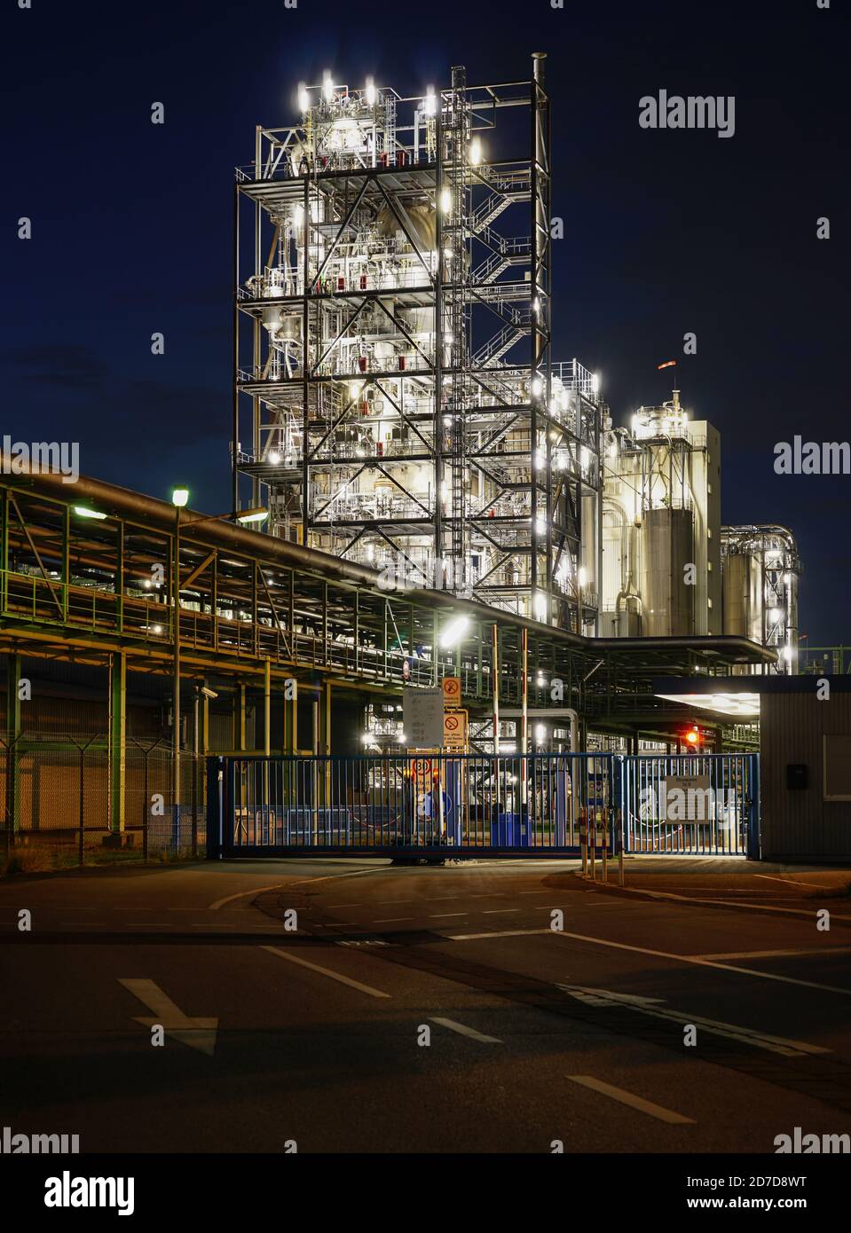 Vertical shot of a Chempark in Dormagen covered in lights at night in ...
