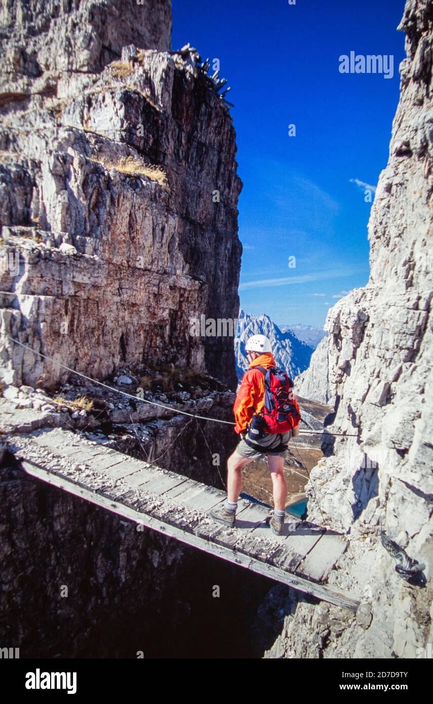 Hikers on via ferrata in the Italian Dolomites Stock Photo - Alamy
