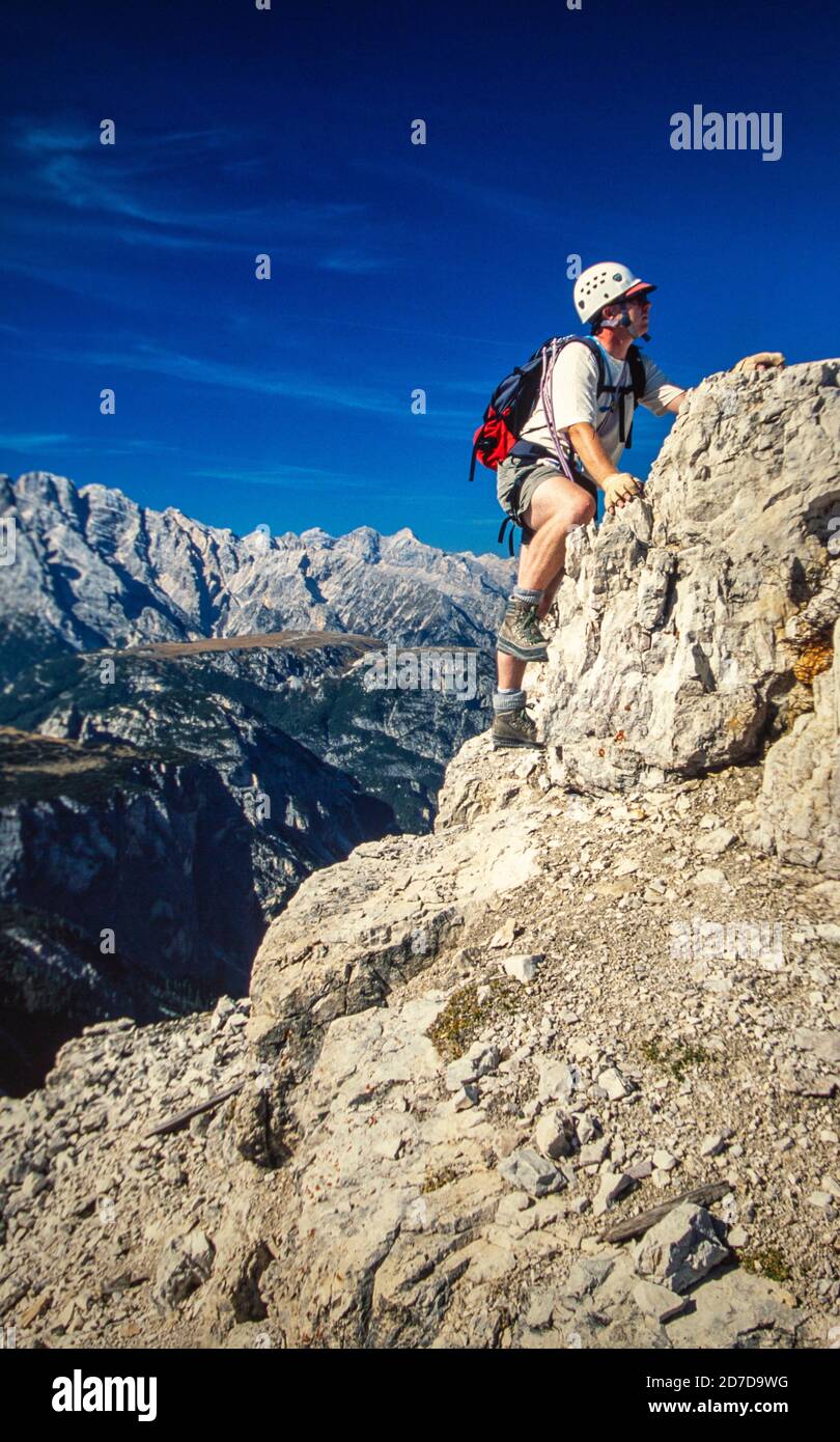 Hikers on via ferrata in the Italian Dolomites Stock Photo - Alamy