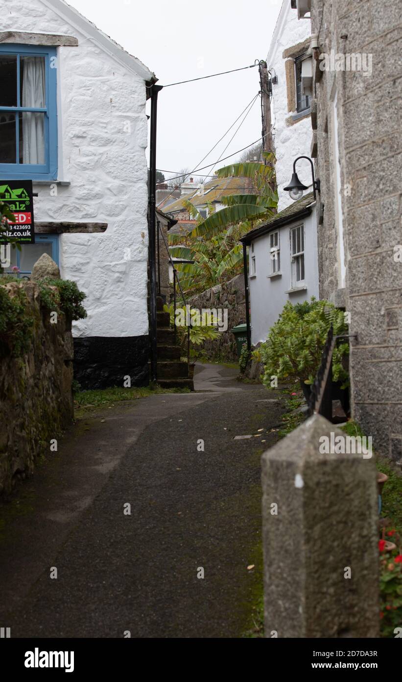 A narrow street in Mousehole Cornwall, UK Stock Photo - Alamy