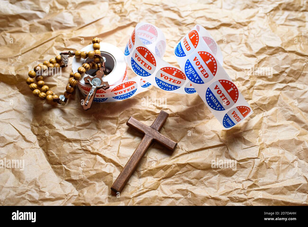 Christian cross and rosary next to the concept of American presidential ...