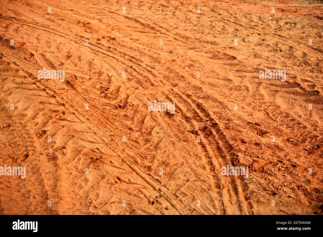 Tire tracks print on dirty red soil. Wheel marks of truck on soil ...