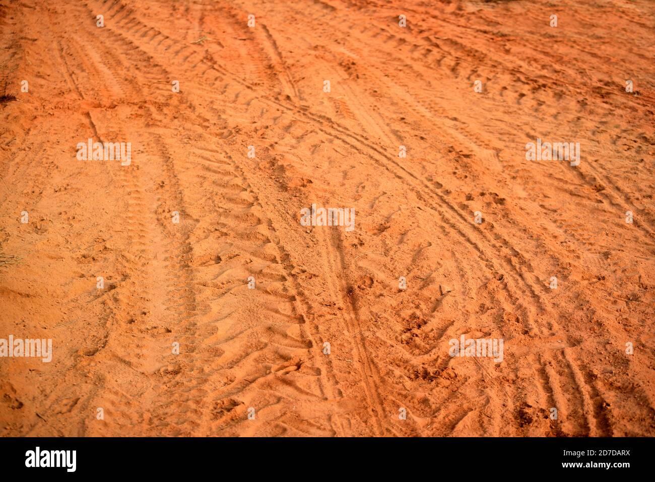 Tire tracks print on dirty red soil. Wheel marks of truck on soil ...