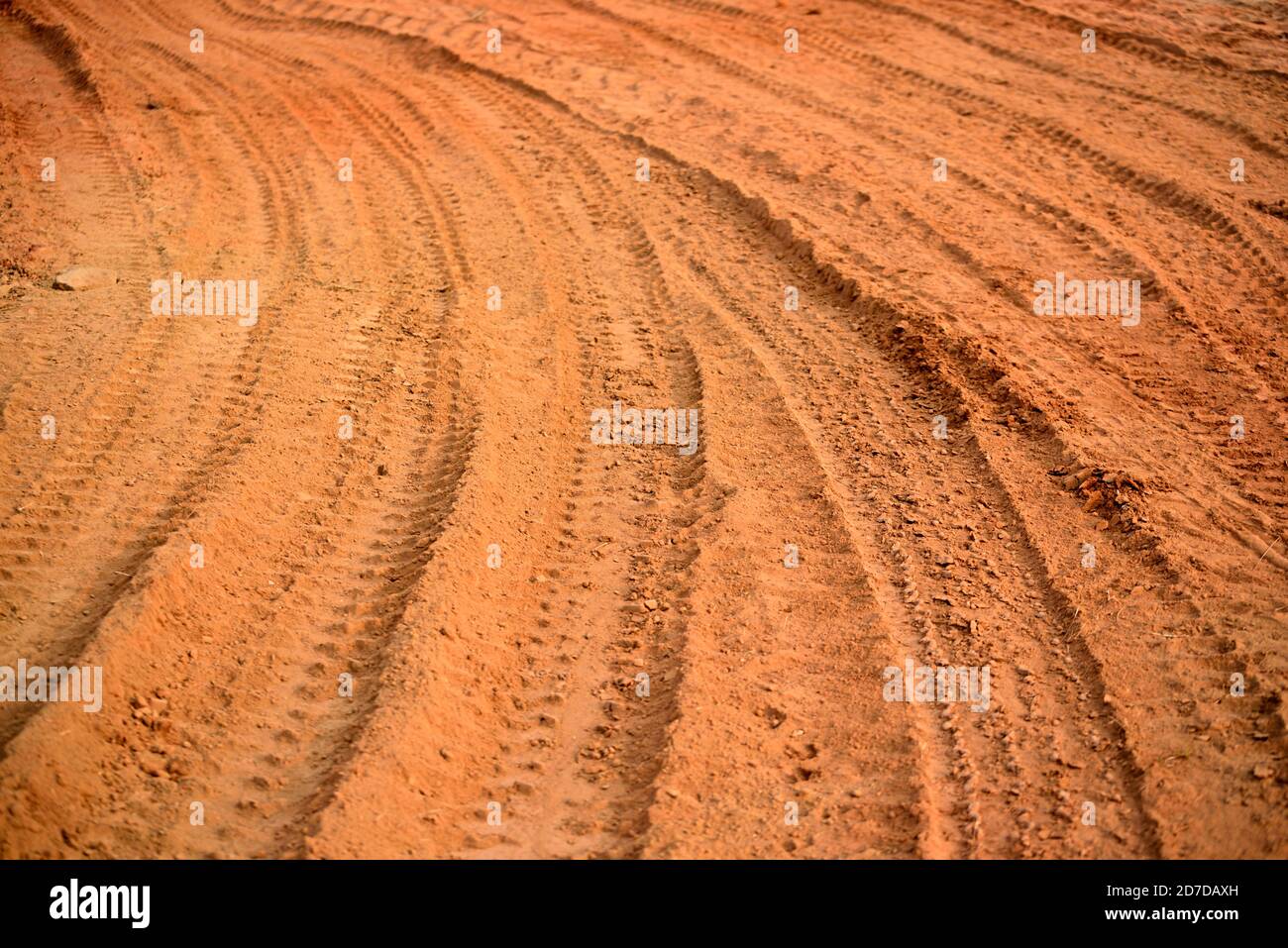Tire tracks print on dirty red soil. Wheel marks of truck on soil ...