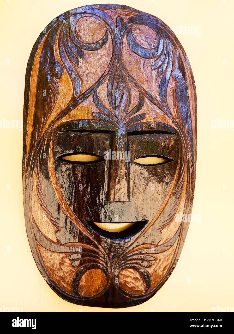 Isolated traditional handcrafted hard wood mask in form of a face, sold ...