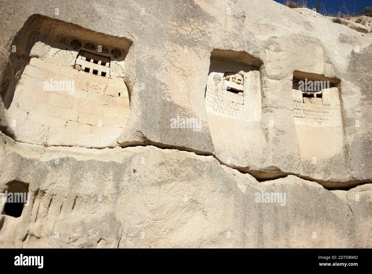 Detail view of house carved in cave Stock Photo - Alamy