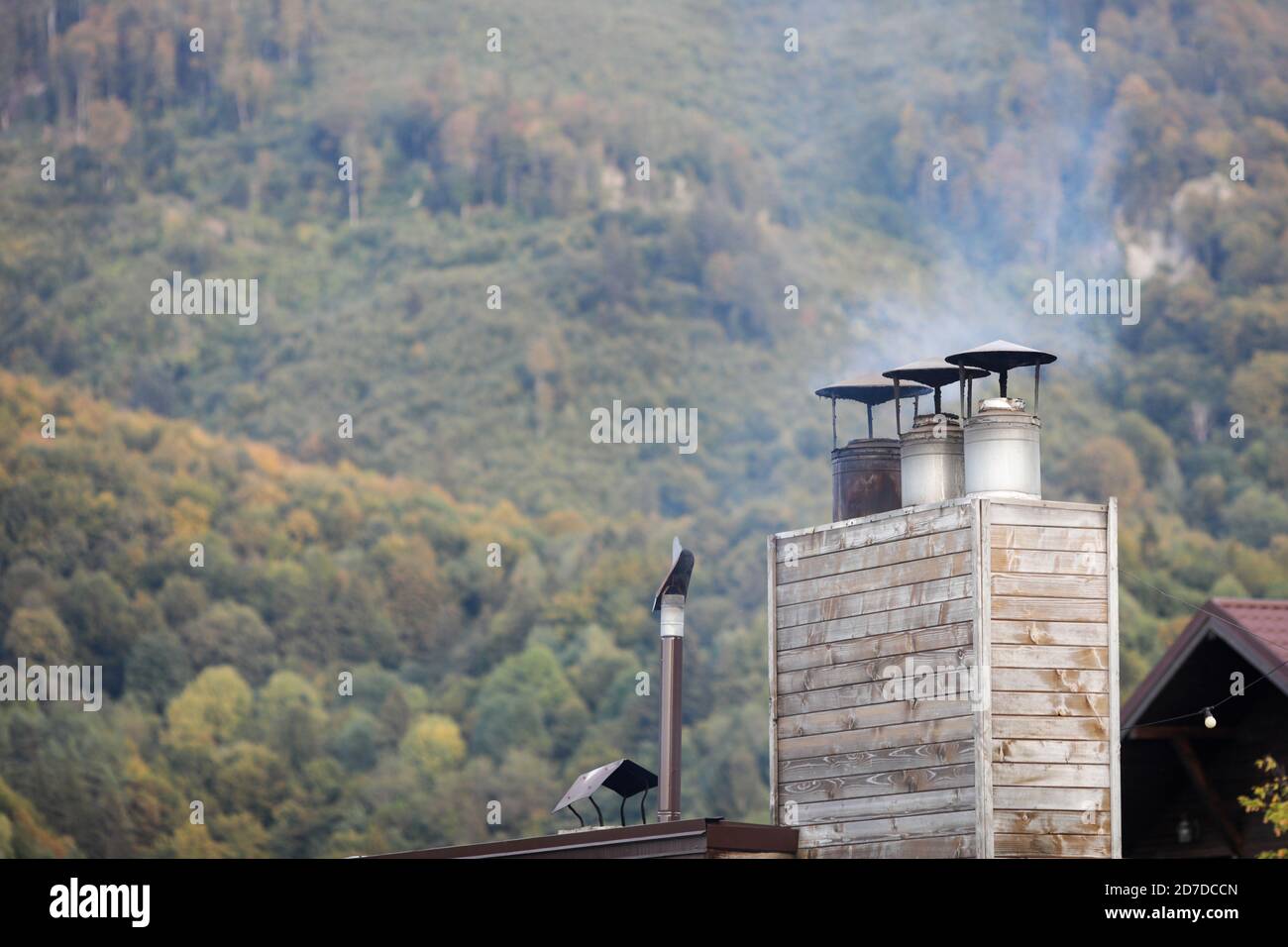 Chimney smoke cabin hi-res stock photography and images - Alamy