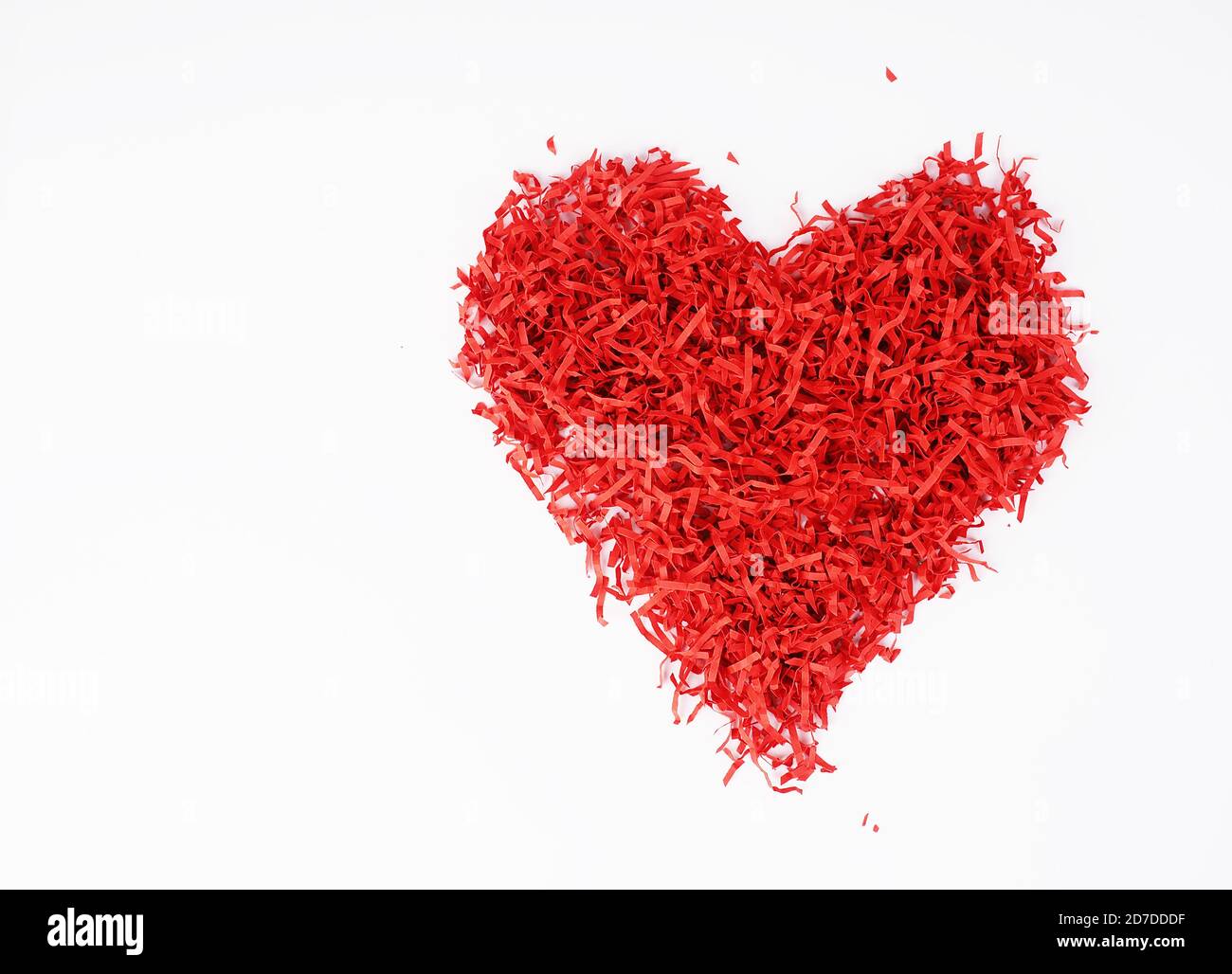 red heart from recycled materials, paper through shredder, the second ...