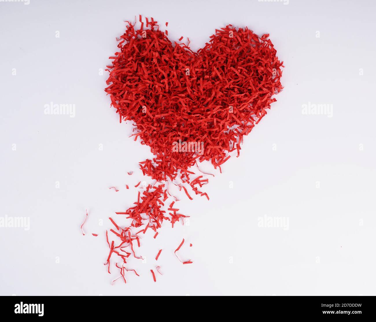 red heart from recycled materials, paper through shredder, the second ...