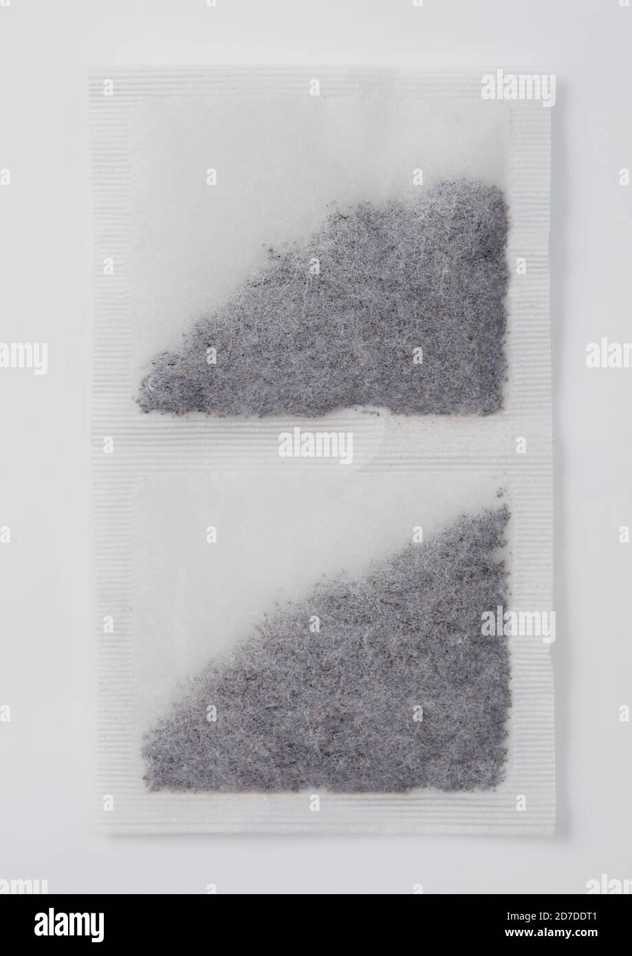 Square traditional black tea teabags isolated on white background Stock ...