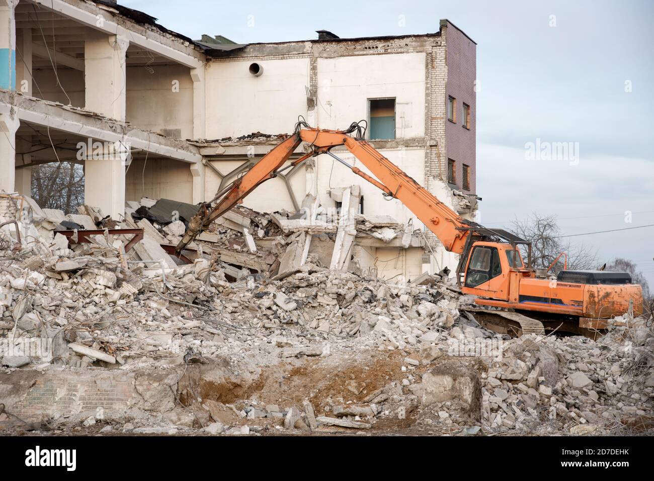High Reach Excavator machines for demolition of tall building. Machine ...