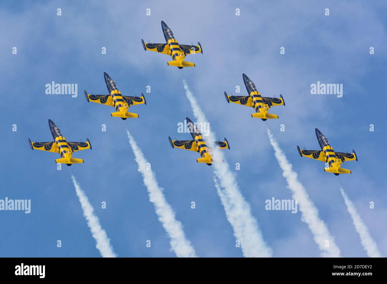 Baltic Bees Jet Team flying in clouds with smoke on at Radom Airshow ...