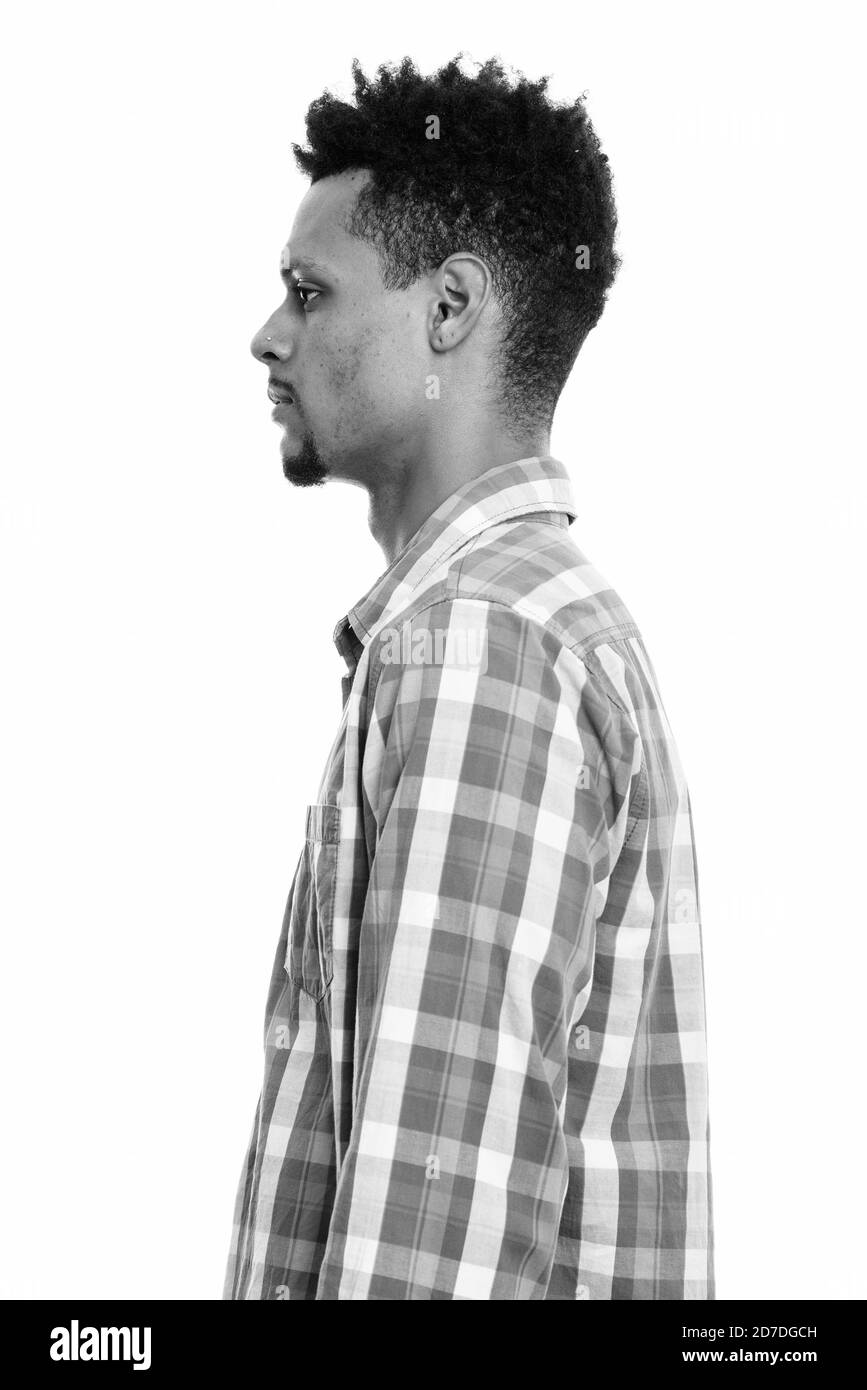 Profile view of young African man Stock Photo - Alamy