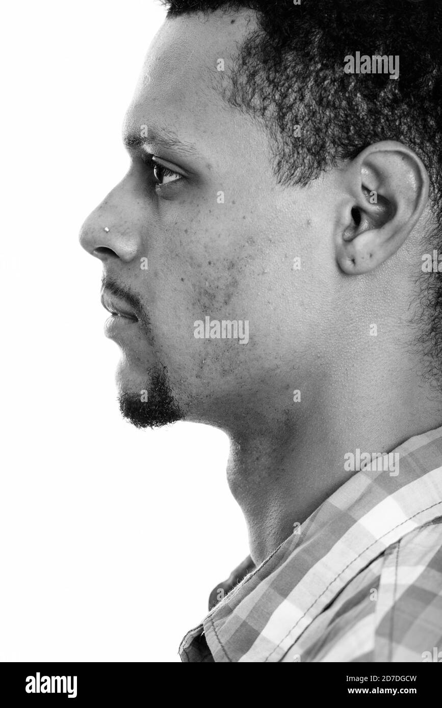 Profile view of face of young African man Stock Photo - Alamy