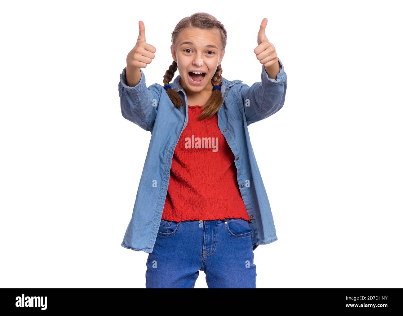Happy teenage girl pointing up, gesturing idea or doing number one ...