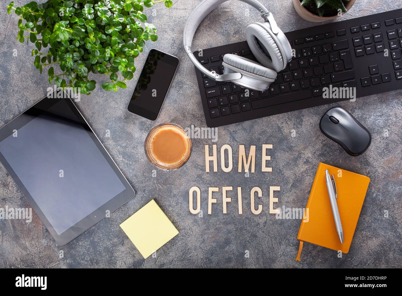 work from home text desk with keyboard computer smartphone notebook ...