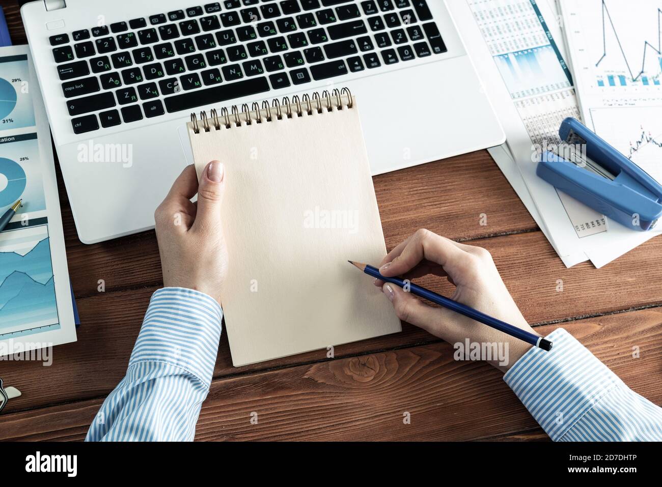 woman with notepad in the office Stock Photo - Alamy