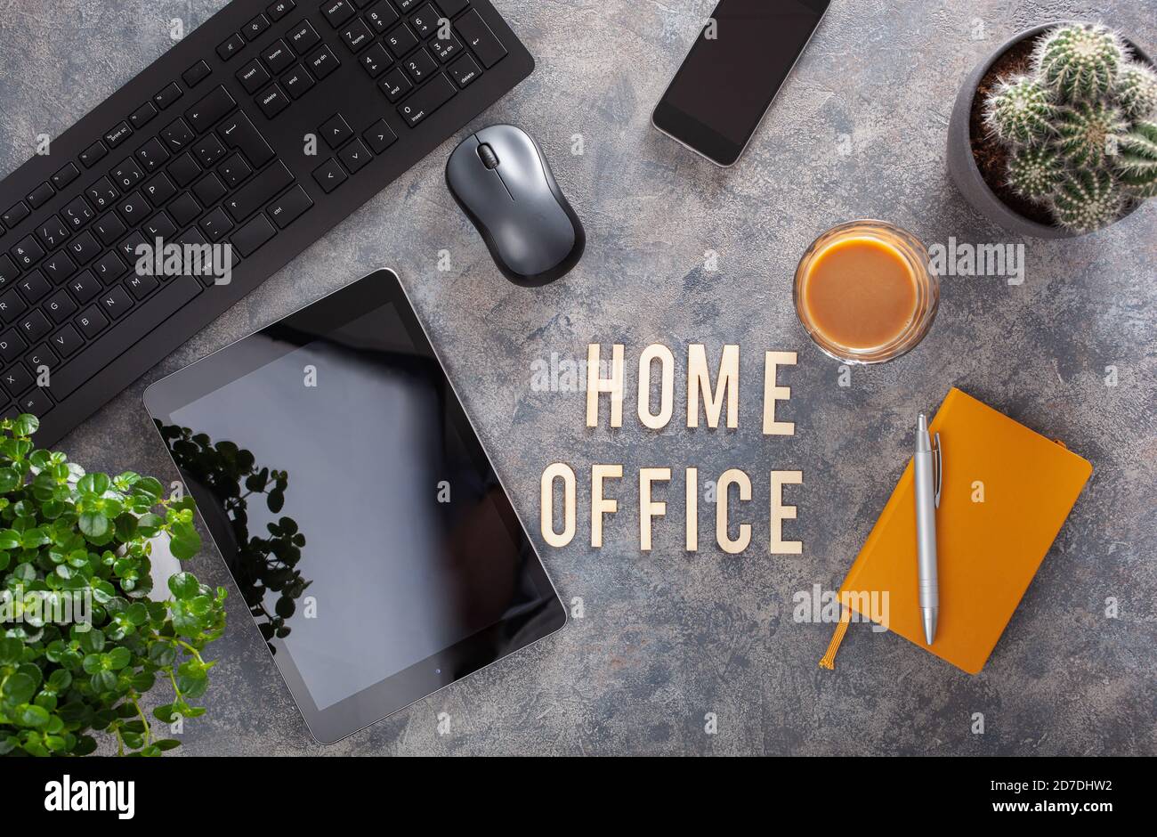 home office text desk with keyboard computer smartphone notebook ...