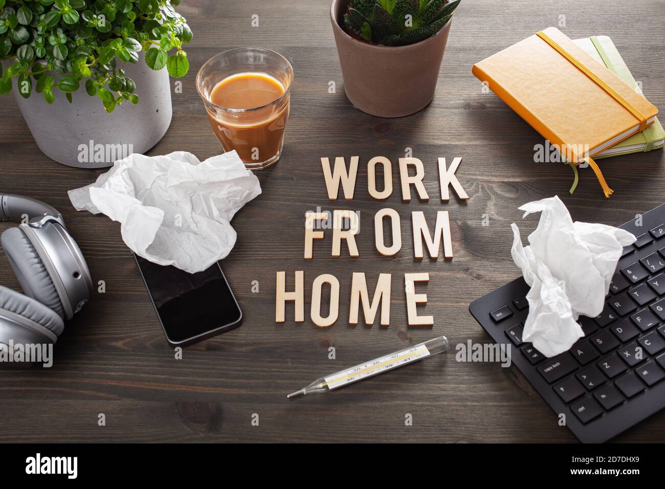 work from home text desk with keyboard computer smartphone notebook ...